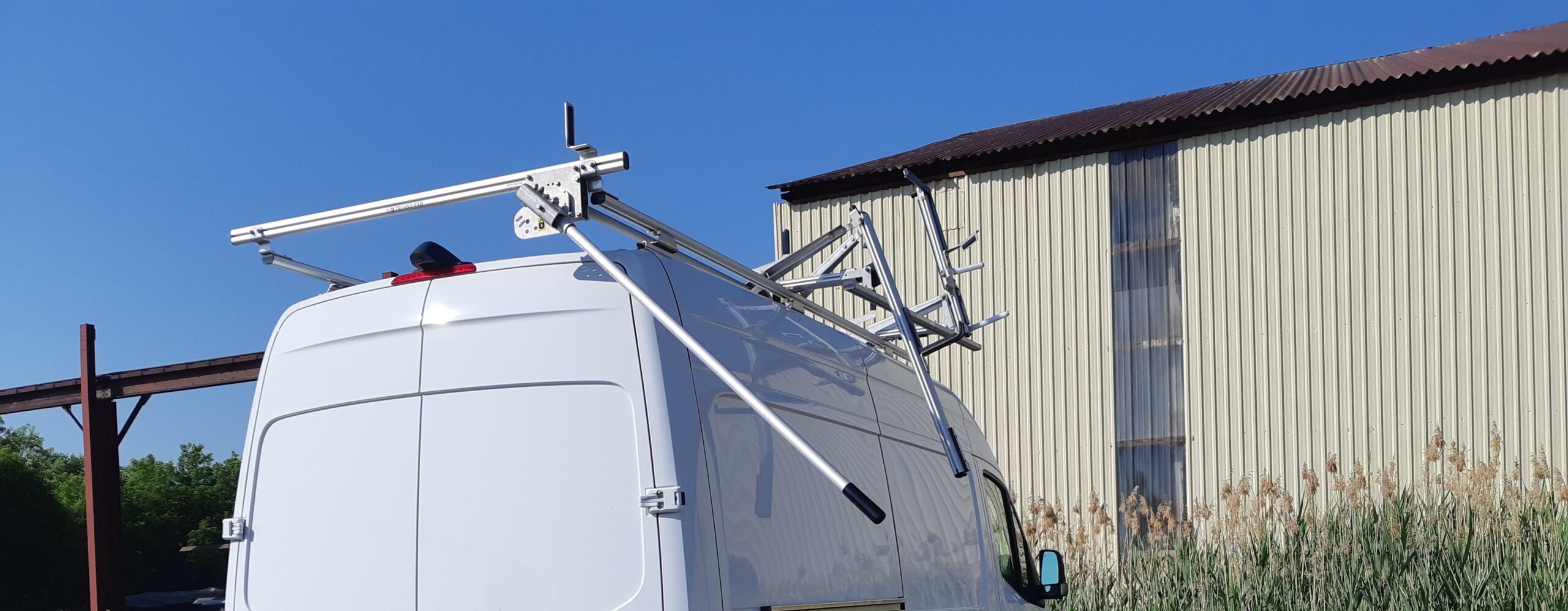 Commercial Van Ladder Racks | Raytel Commercial Van Outfitters